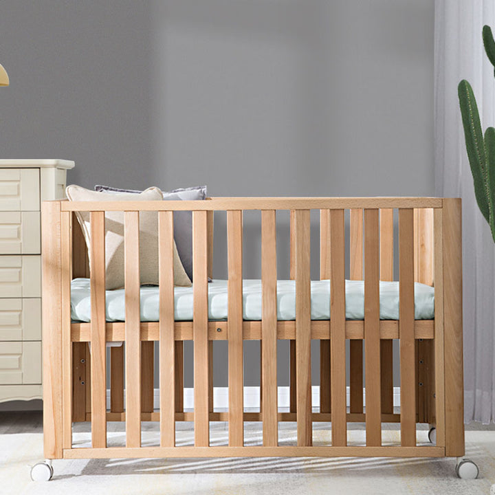 hansel convertible crib in natural wood – barnmöbler PH